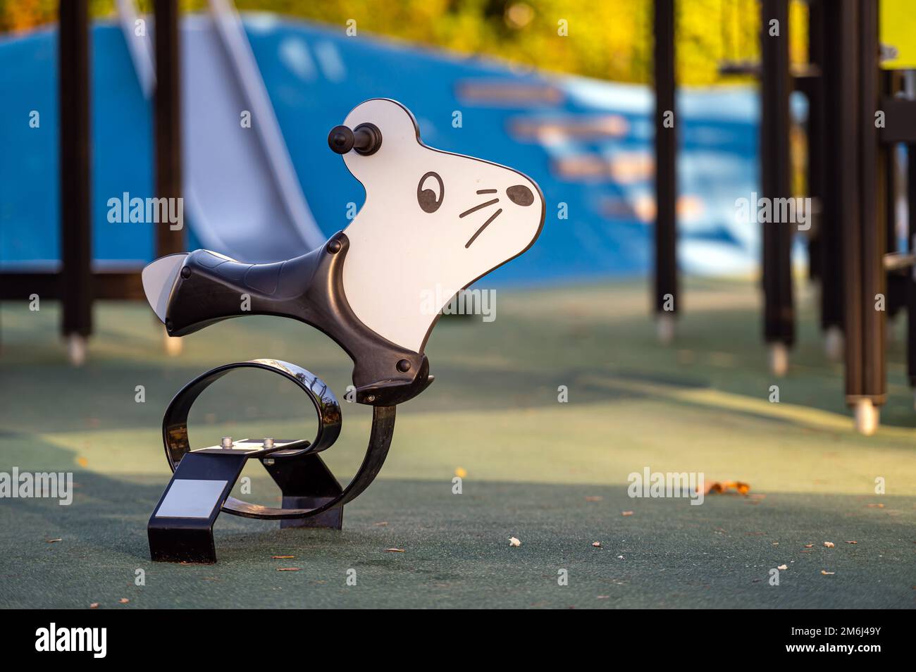 swing mouse toy for kids on a childrens playground, swing for children ...