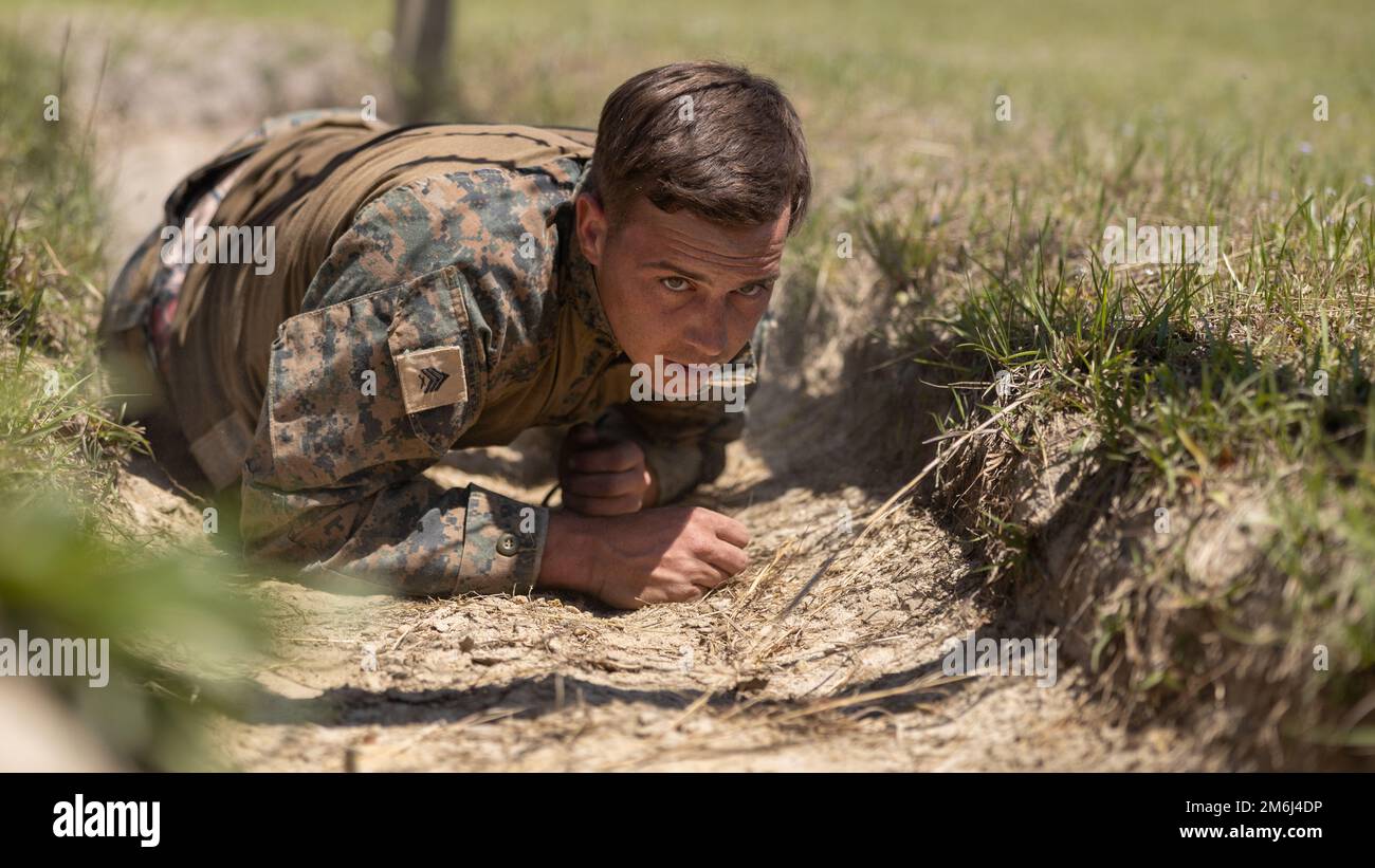 A U.S. Marine with 1st Battalion, 8th Marines, traverses the Devil Dog ...