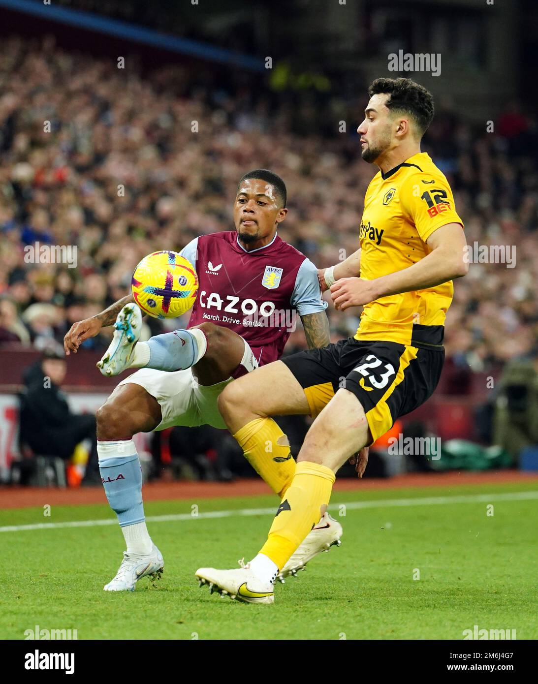 Aston Villa's Leon Bailey (left) and Wolverhampton Wanderers' Max ...