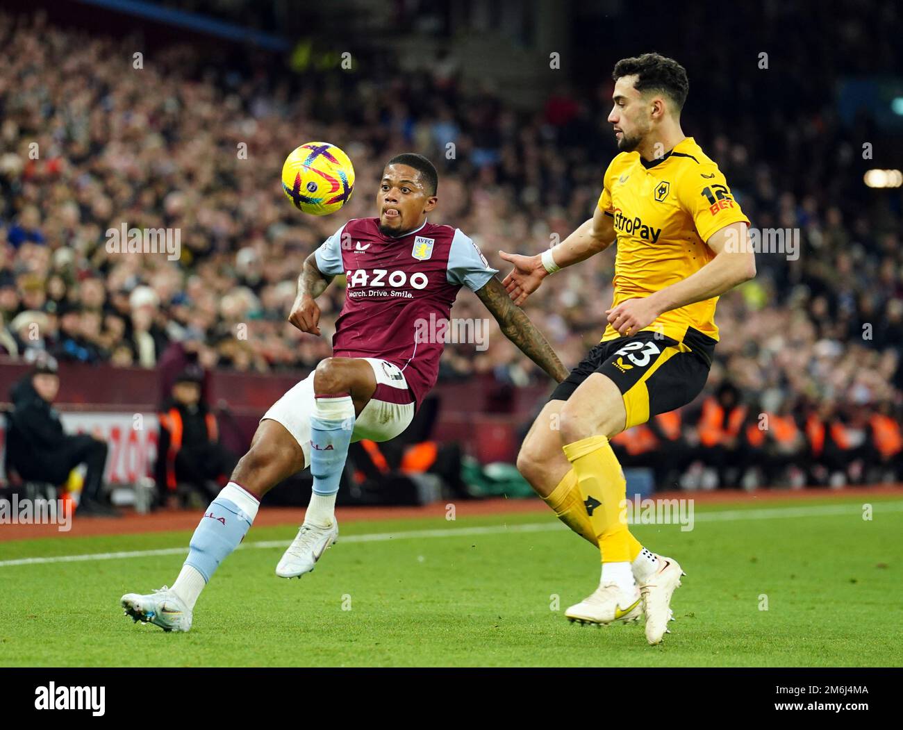 Aston Villa's Leon Bailey (left) and Wolverhampton Wanderers' Max ...
