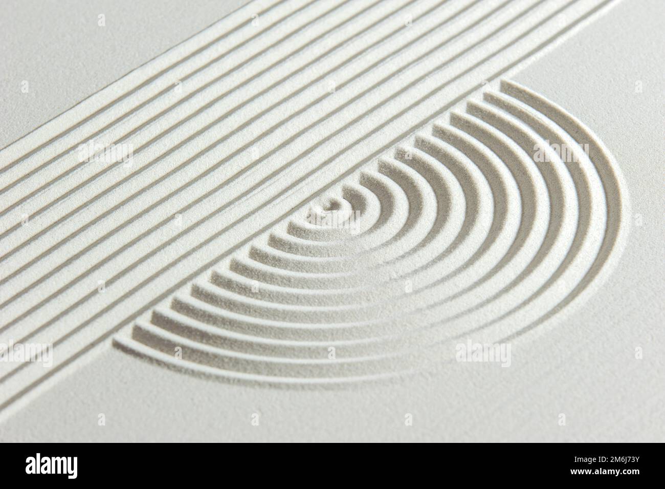 Japanese zen garden with yin and yang and feng shui in textured sand ...