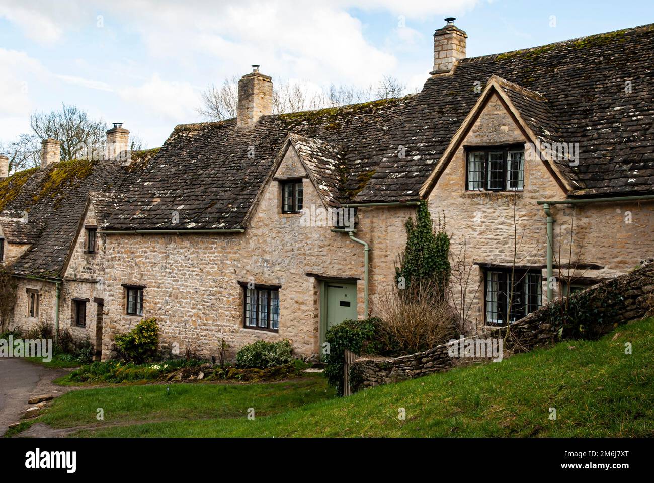 Old traditional romantic stone English country house Stock Photo - Alamy