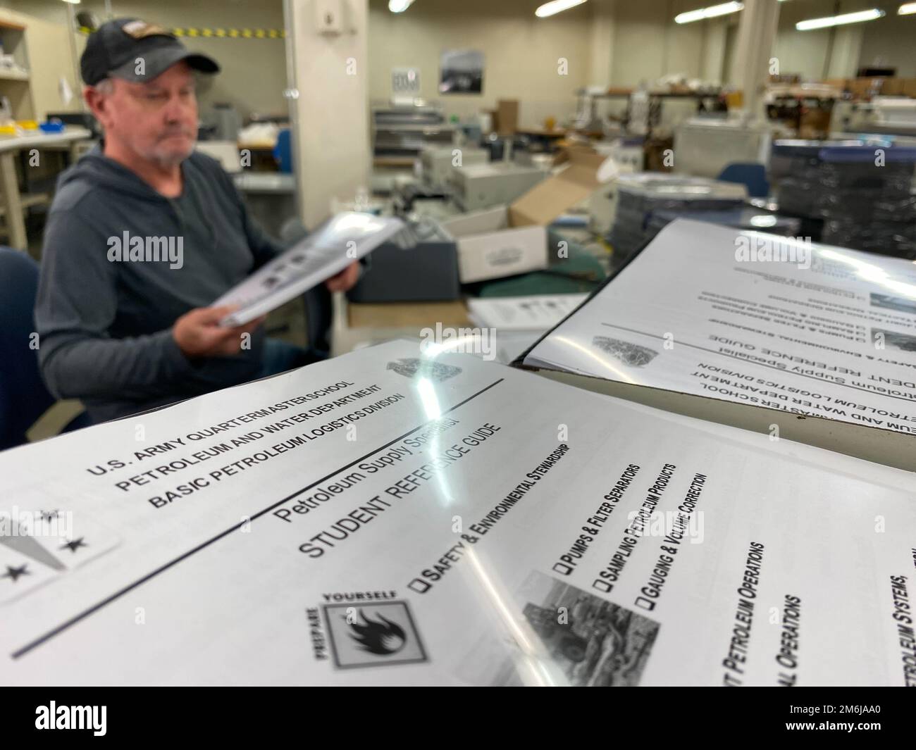 Michael Tuliback, Electronic Equipment Operator, DLA Document Services Philadelphia is attaching ...