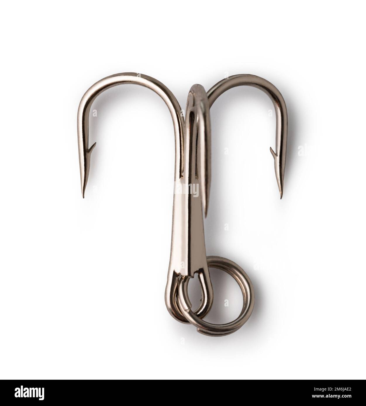 Fishing hooks on a white background Stock Photo - Alamy
