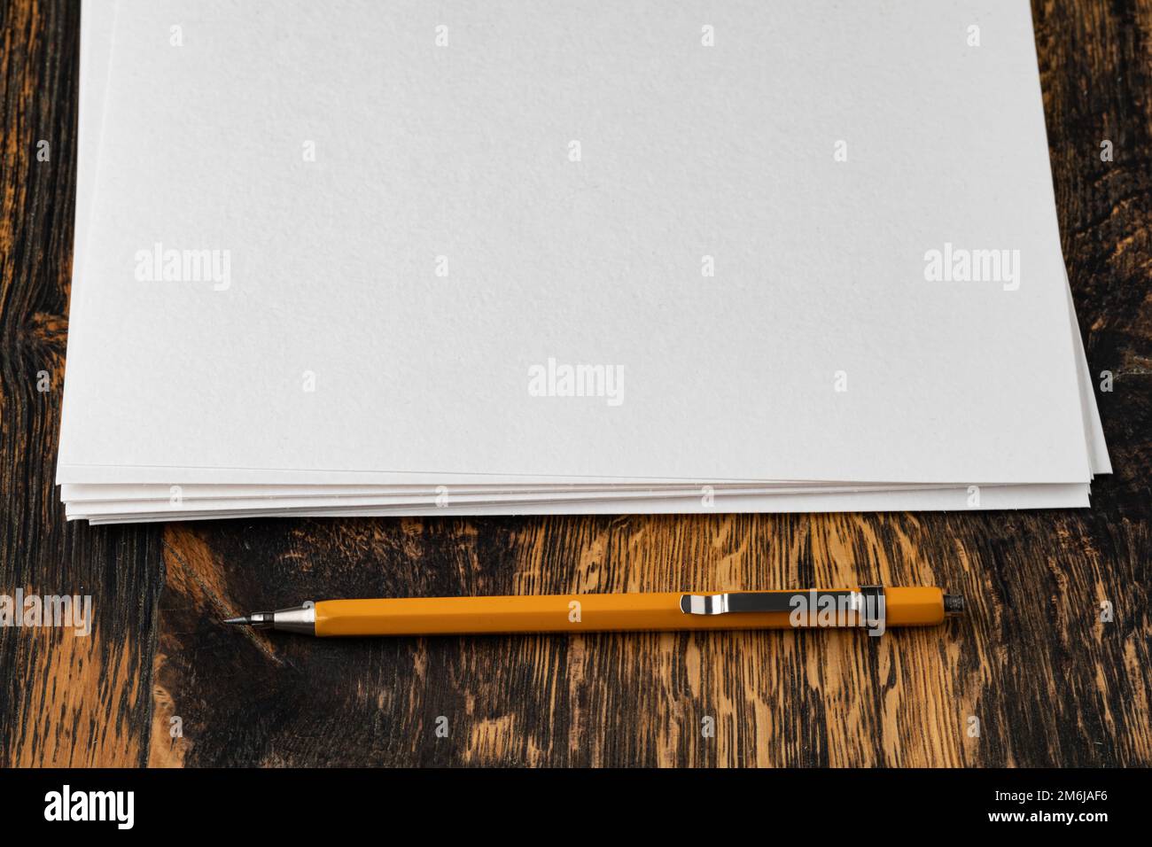 Blank paper with mechanical pencil Stock Photo - Alamy