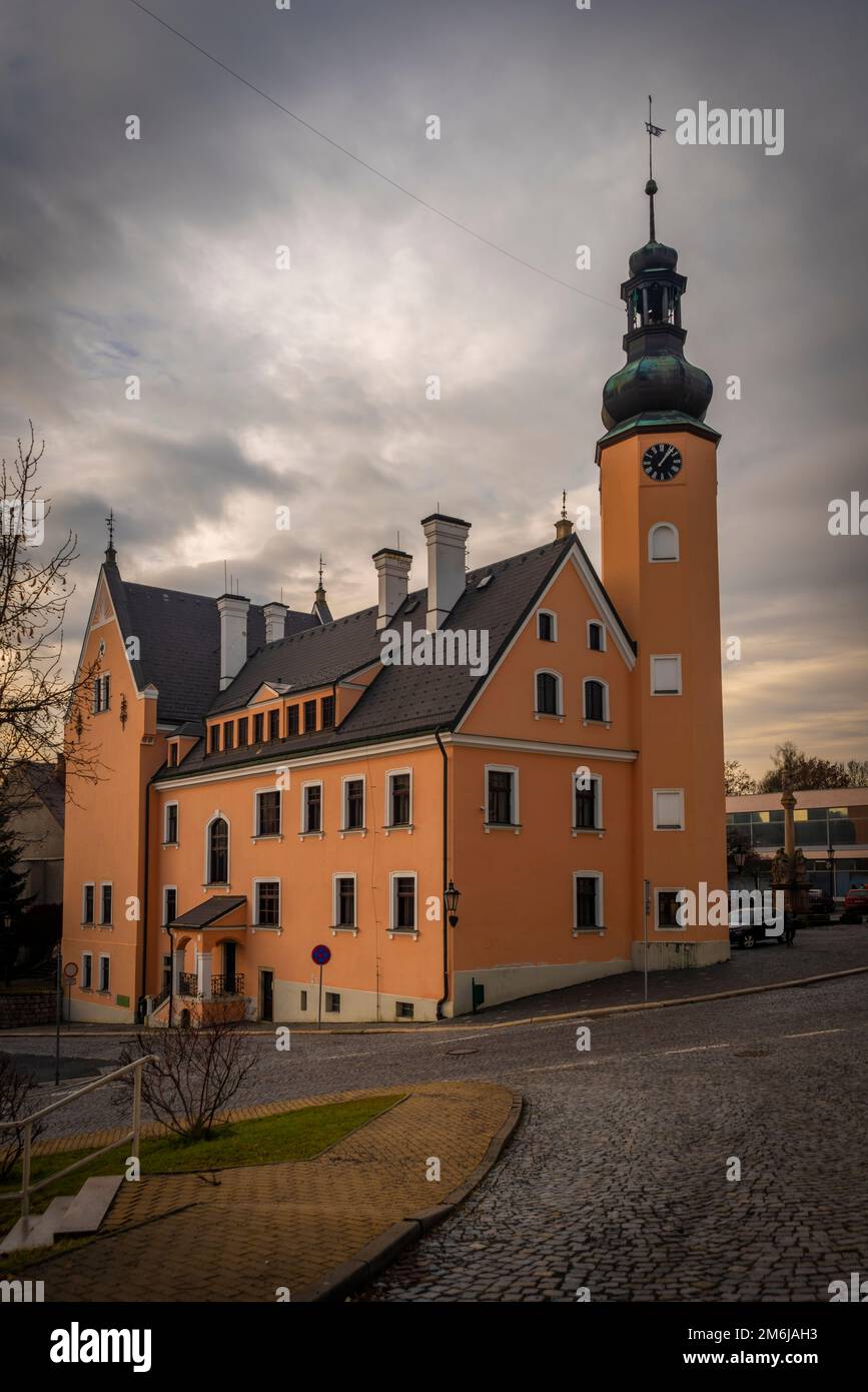 Church on main square in Cesky Dub town under Jested hill in winter day ...
