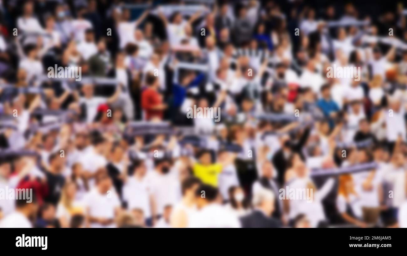 Blurred supporters crowd in a basketball court during game Stock Photo ...