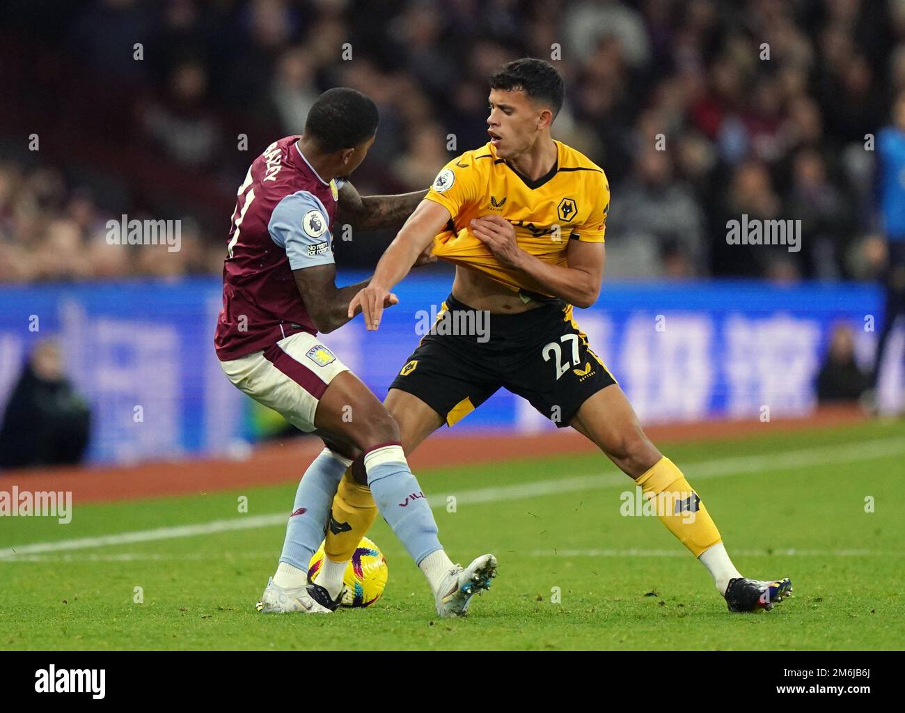 Aston Villa's Leon Bailey (left) and Wolverhampton Wanderers' Matheus ...