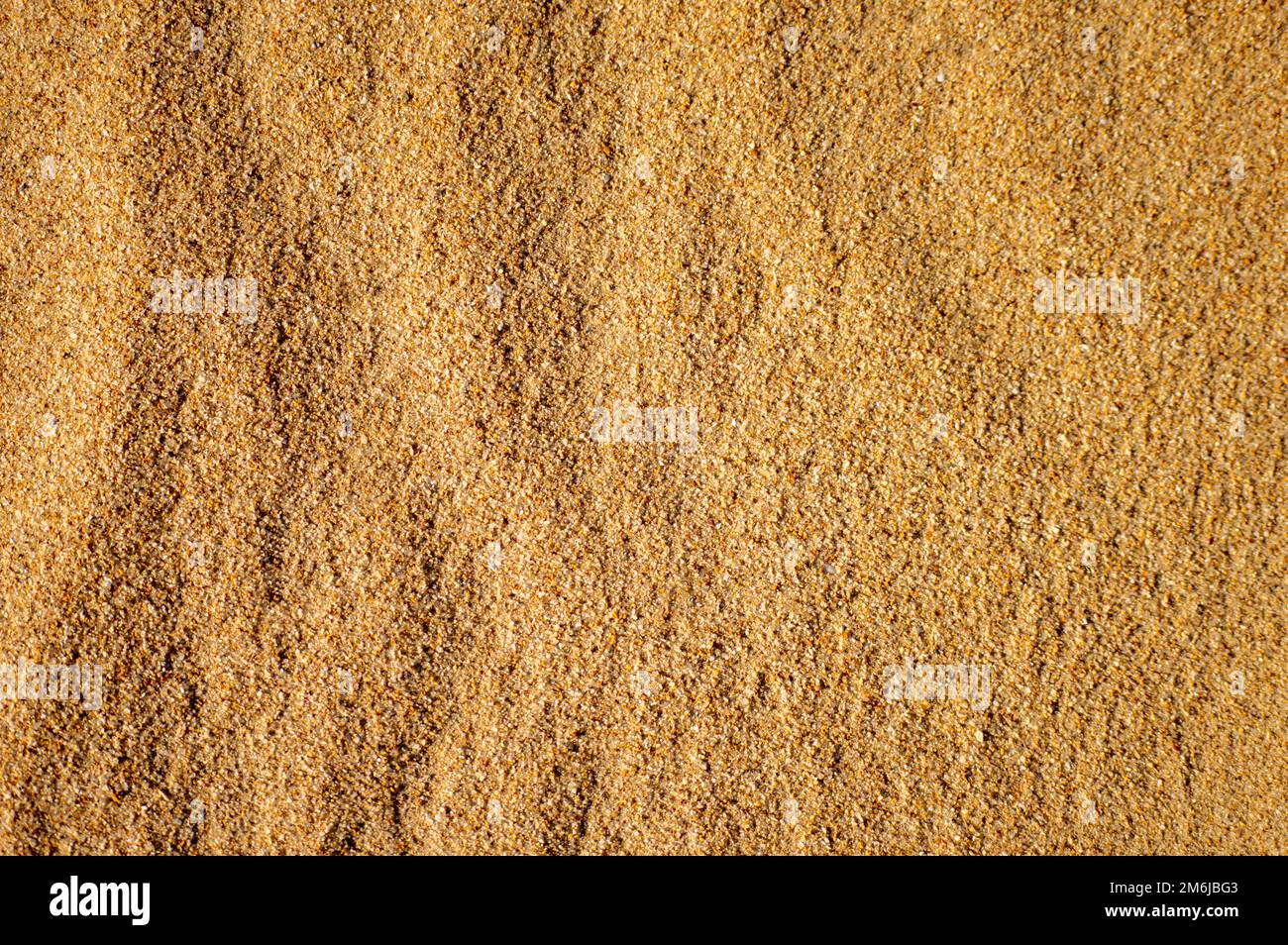 Gold sand texture, background series Stock Photo - Alamy