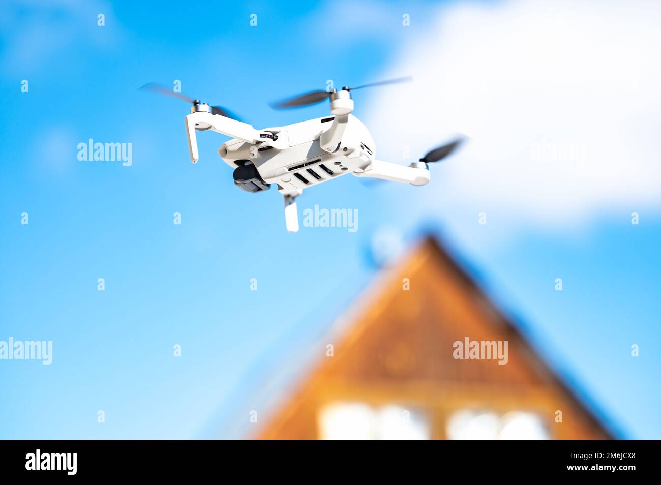 Quadcopter in flight Stock Photo - Alamy