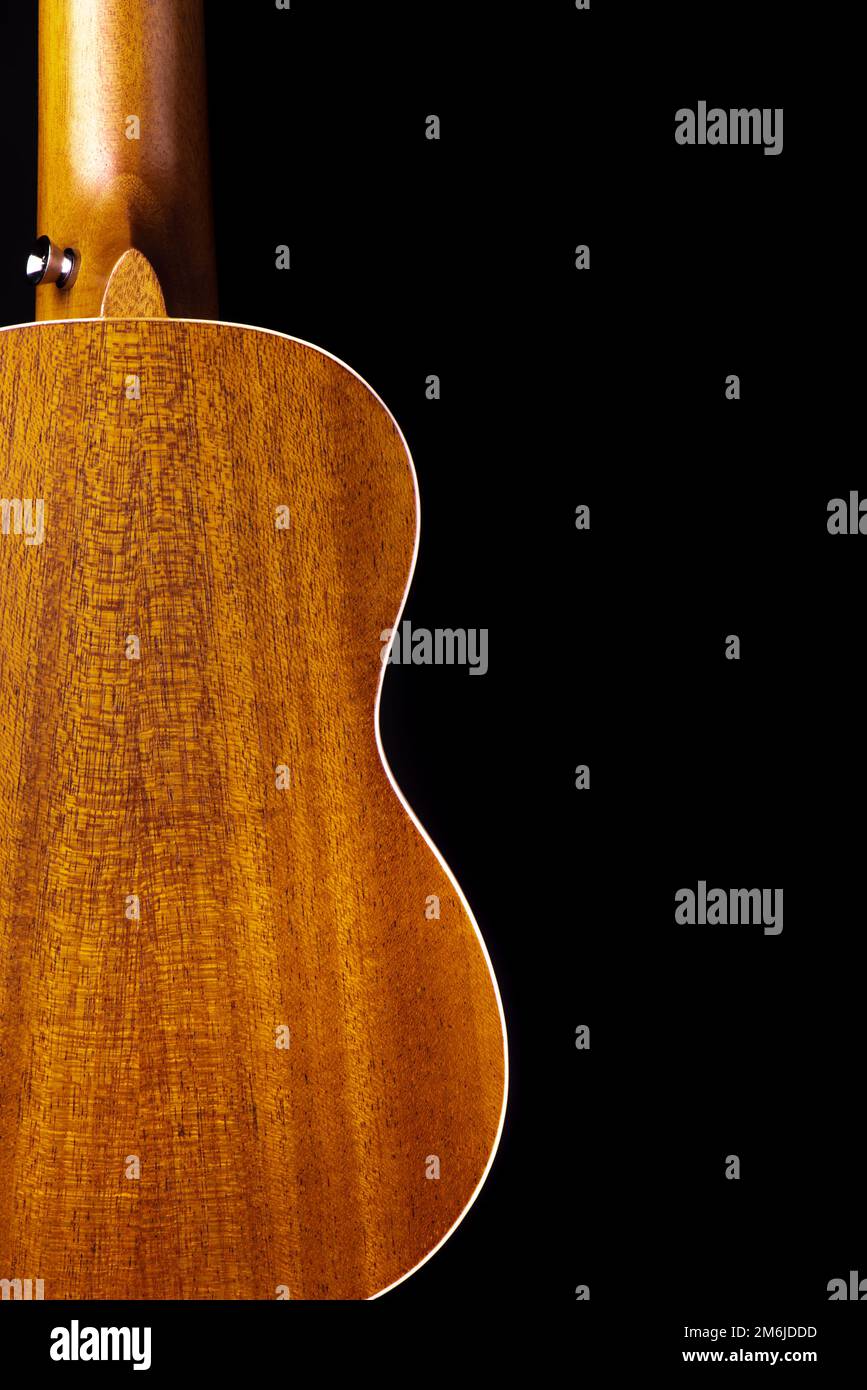 Brown guitar ukulele back view silouette close up Stock Photo - Alamy