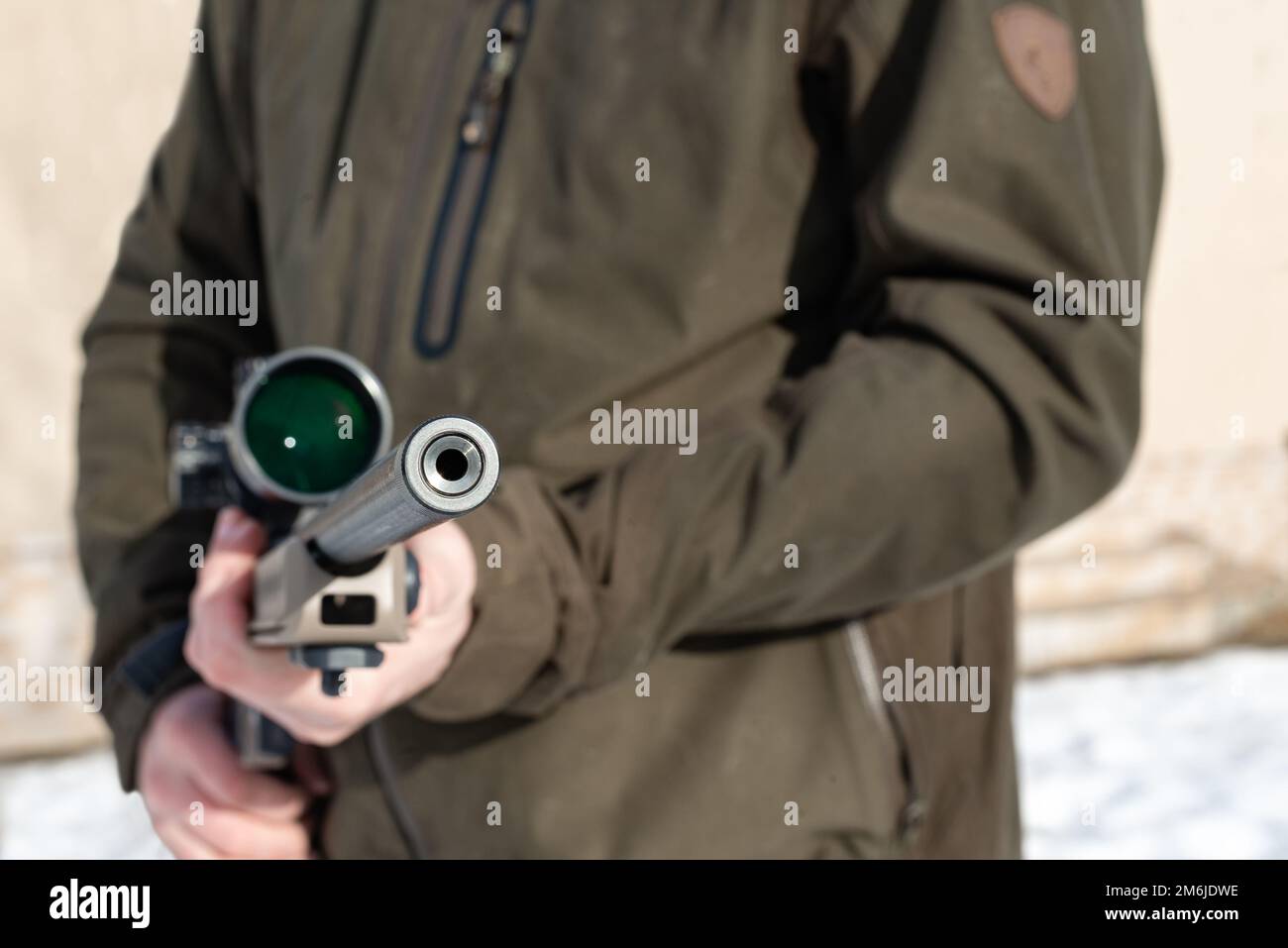 Mans hand holding gun hi-res stock photography and images - Alamy