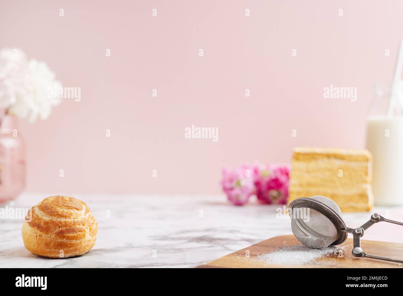 Homemade profitroles pastry filled with custard. Eclairs with cream ...