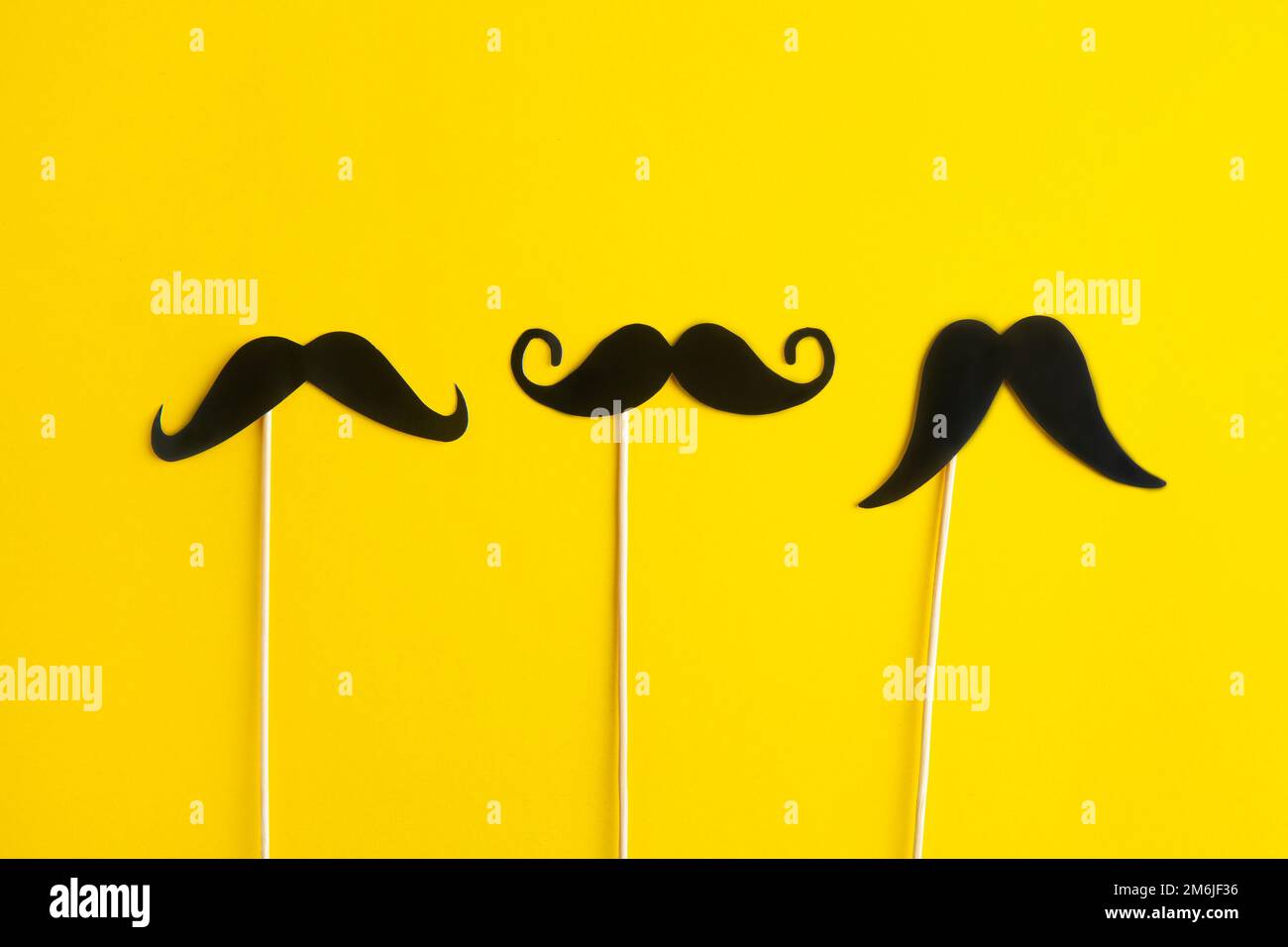 Father's Day Holiday Concept. Transparent glasses, stylish black paper ...