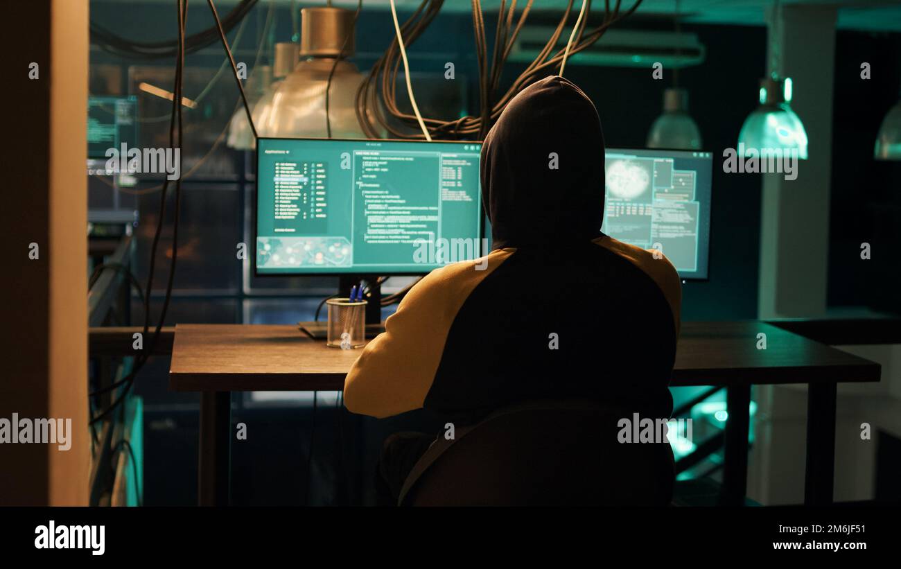 Hacker man trying breach security hi-res stock photography and images ...