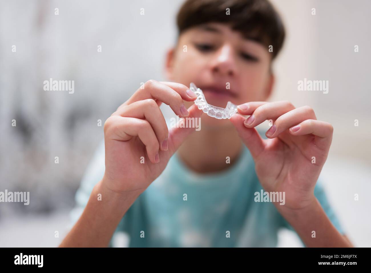 Teenager boy wear simulator orthodontic silicone invisible leveling ...