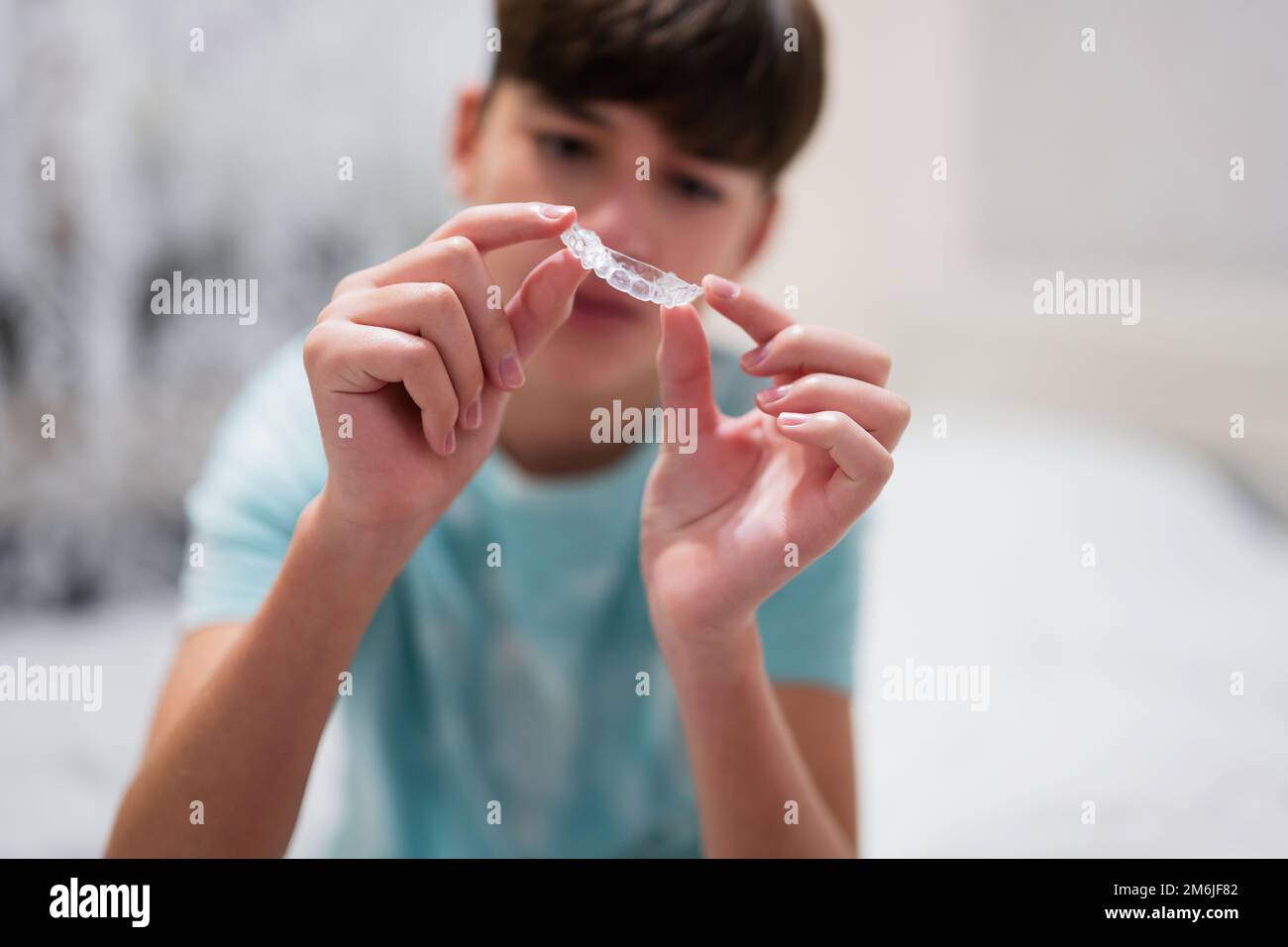 Teenager boy wear simulator orthodontic silicone invisible leveling ...