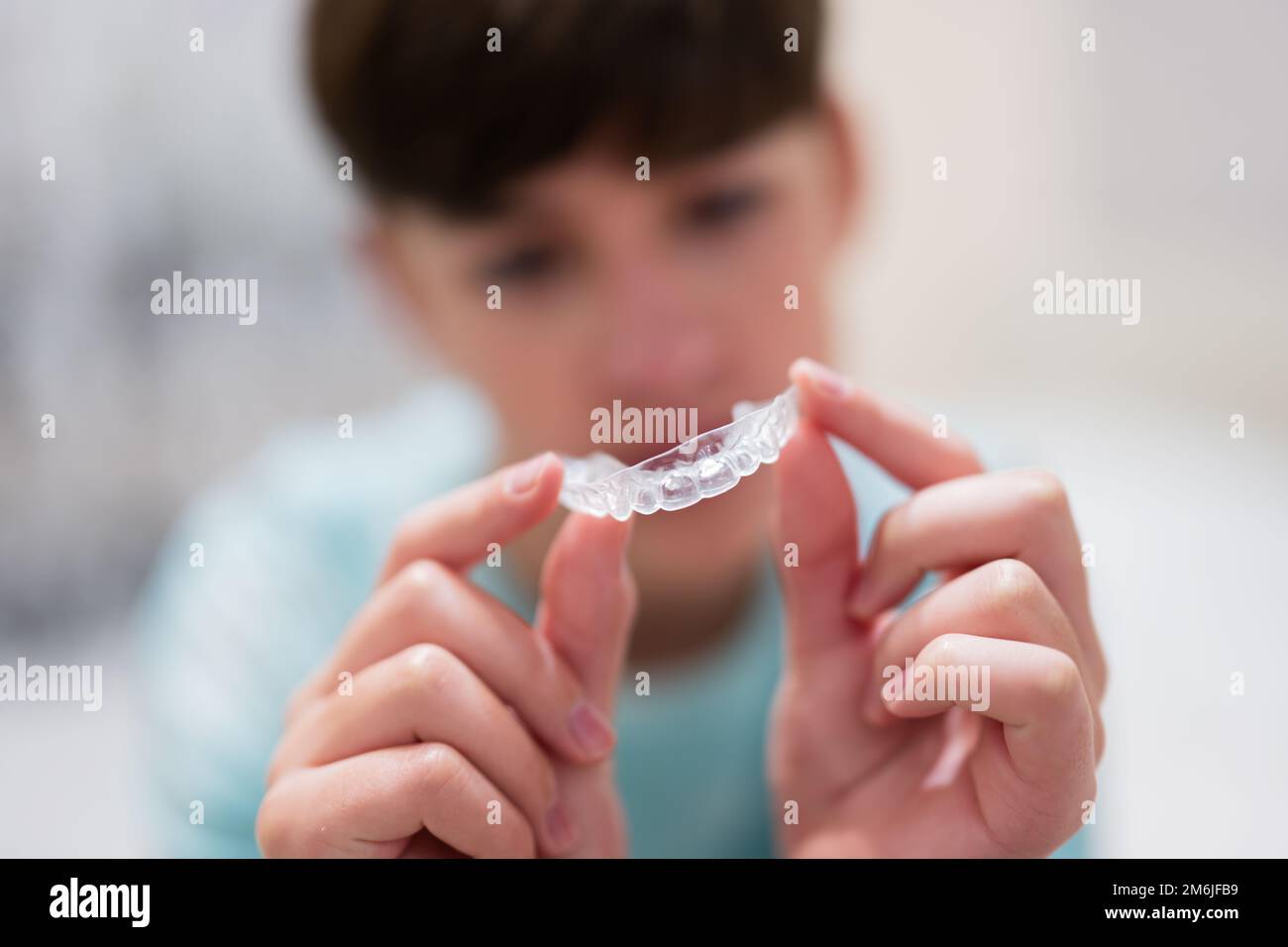 Teenager boy wear simulator orthodontic silicone invisible leveling ...