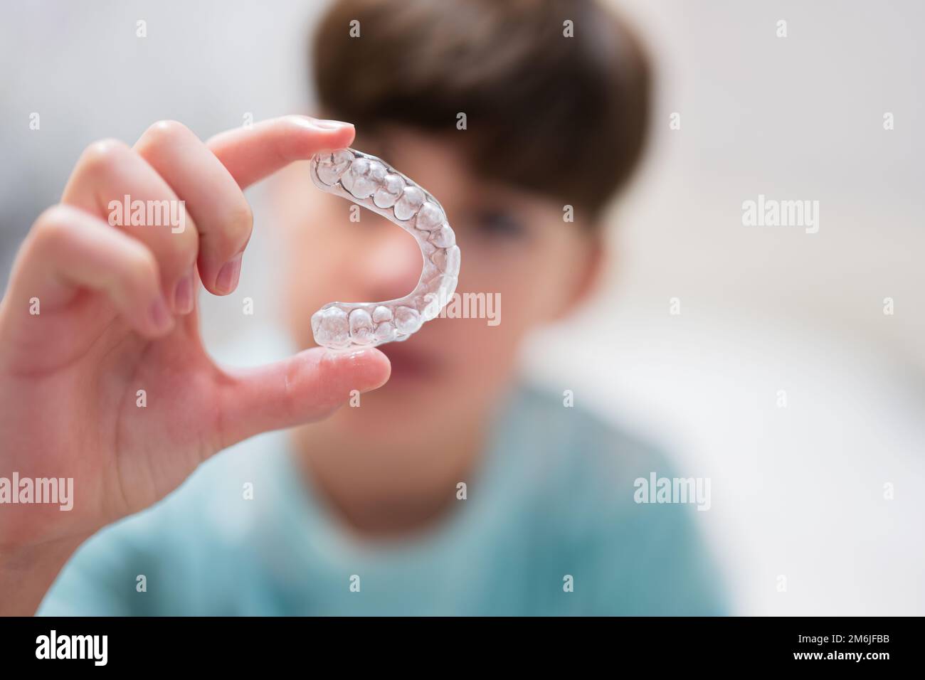 Teenager boy wear simulator orthodontic silicone invisible leveling ...