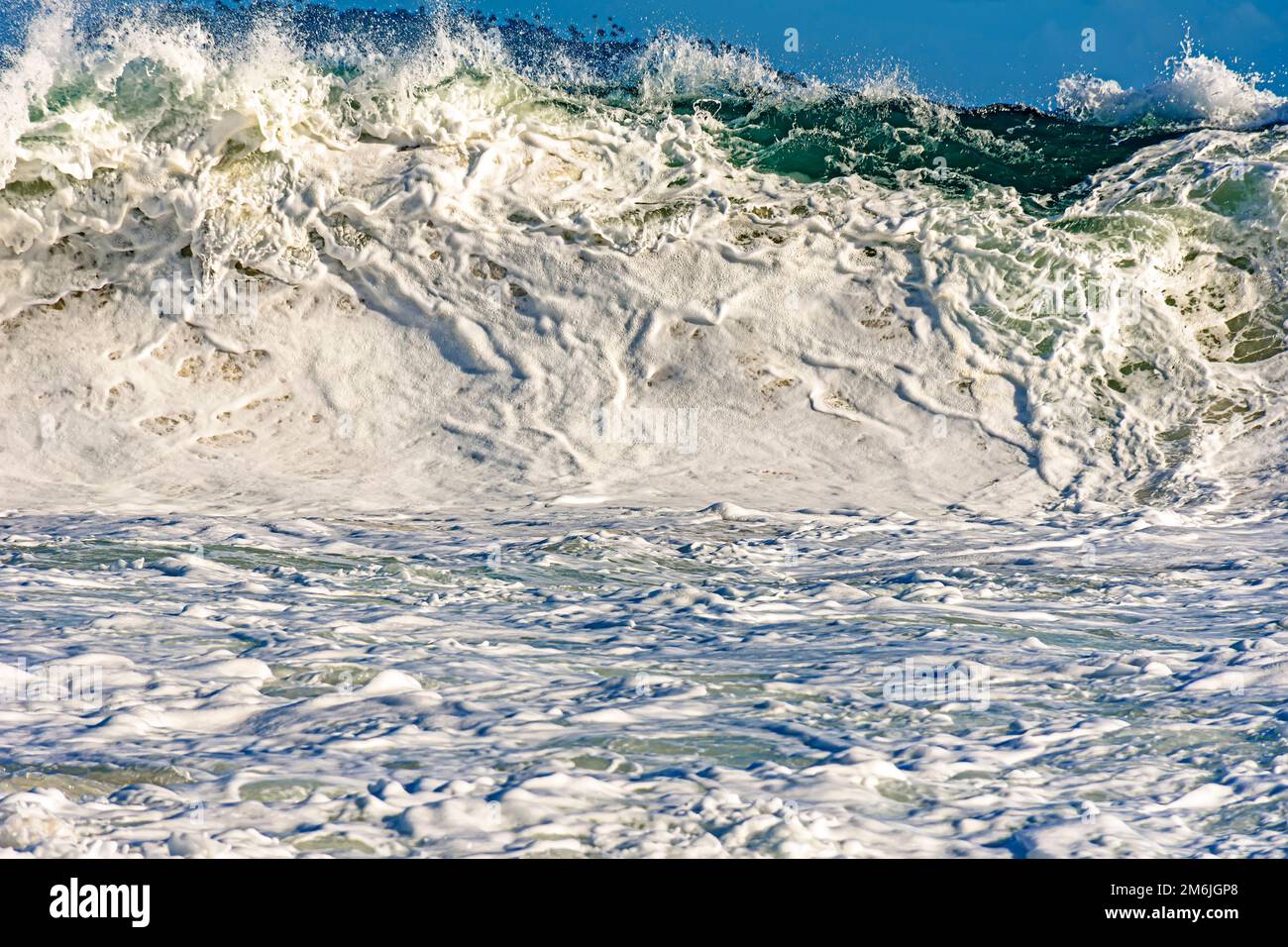 Strong wave and sea foam Stock Photo - Alamy