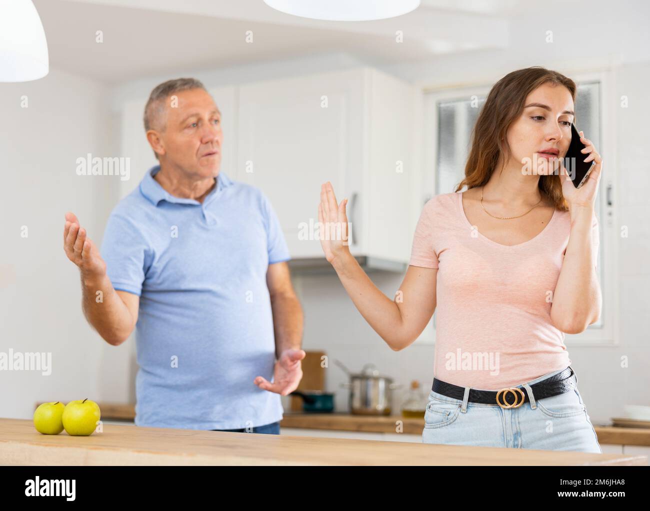 Daughter father scolding and yelling at her in home kitchen Stock Photo ...