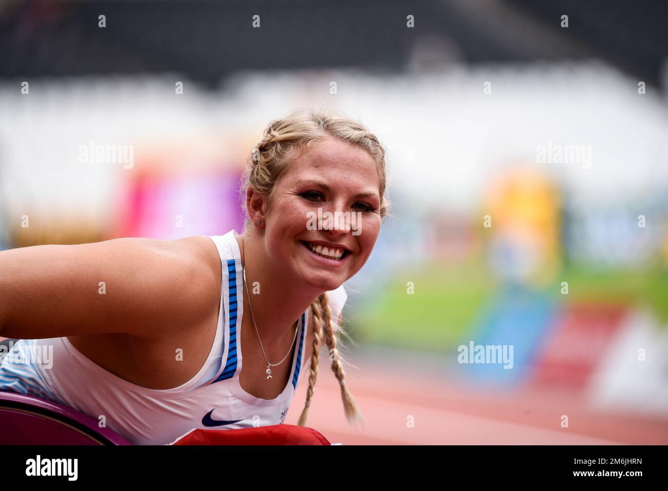 Sammi Kinghorn celebrating winning gold in the 100m T53 wheelchair race ...