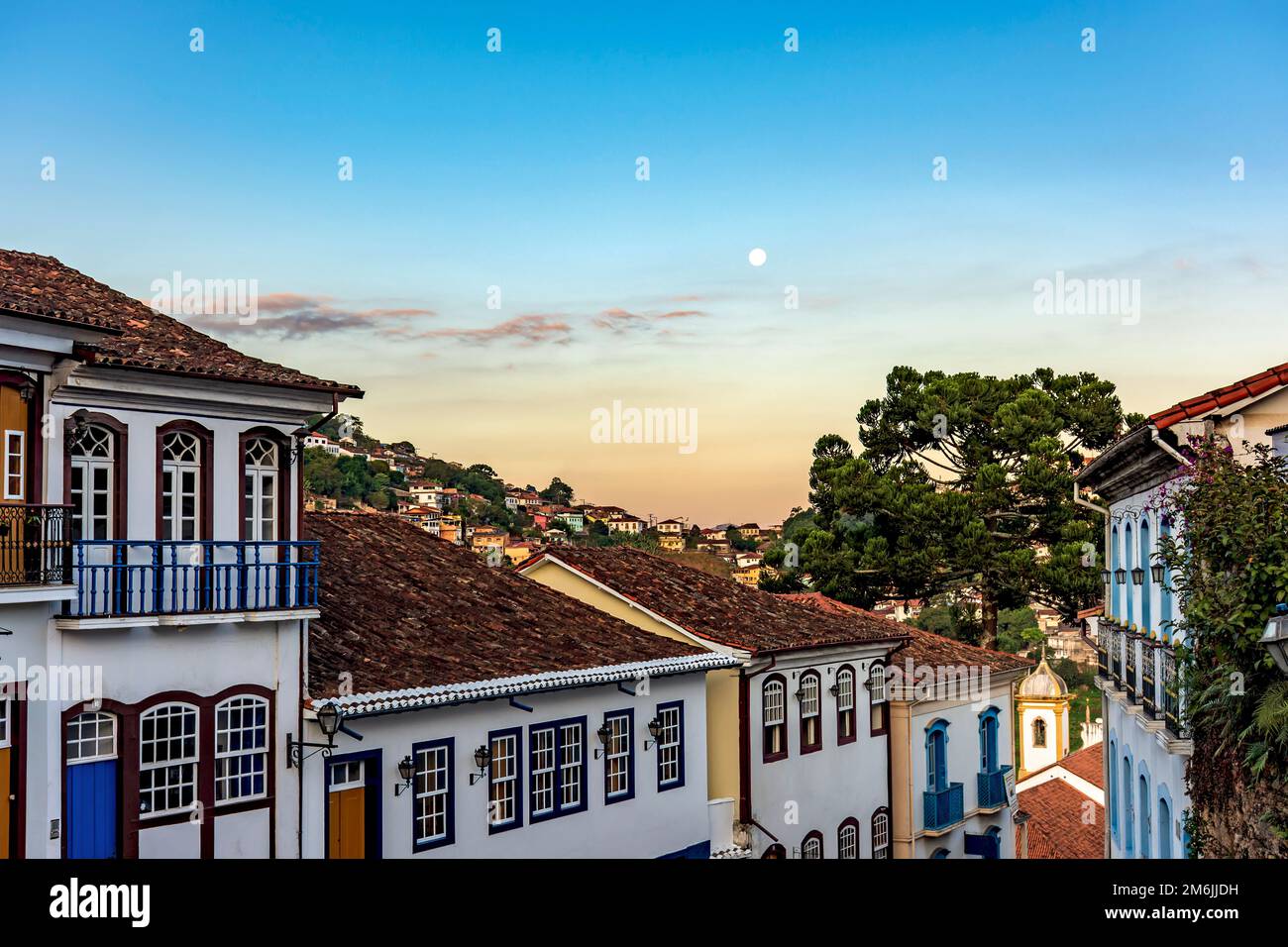 Old colonial style houses with their balconies at dusk Stock Photo - Alamy