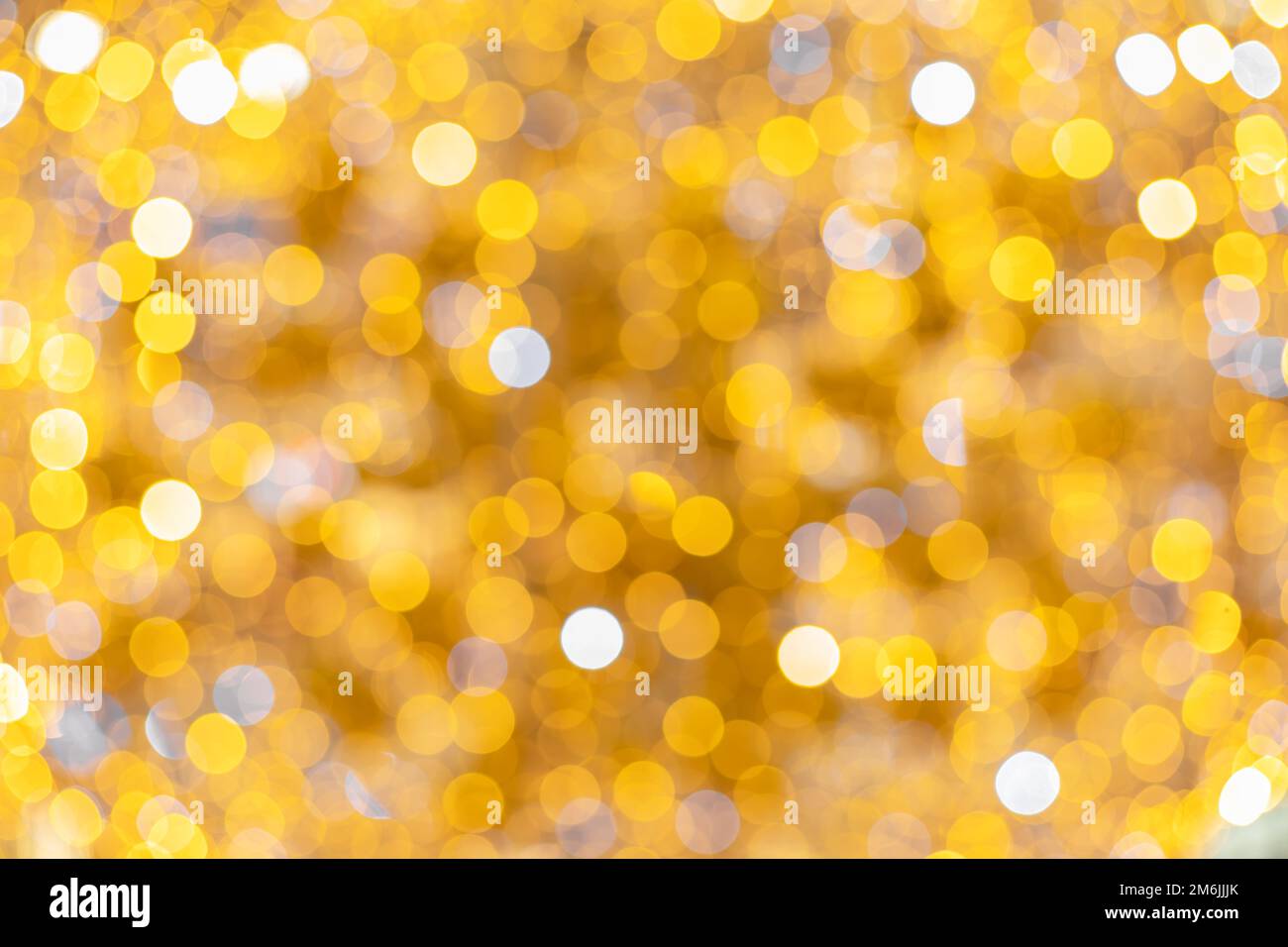 Bright bokeh overflow in yellow shades. Optical defocus effect ...
