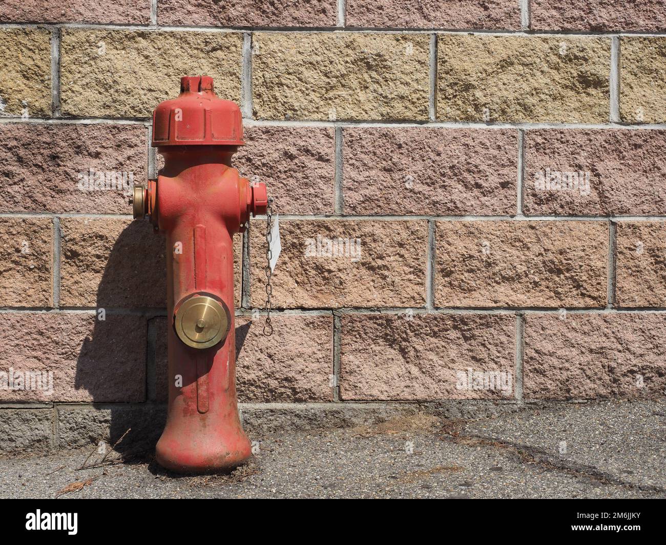 Fire hydrant before a wall Stock Photo - Alamy
