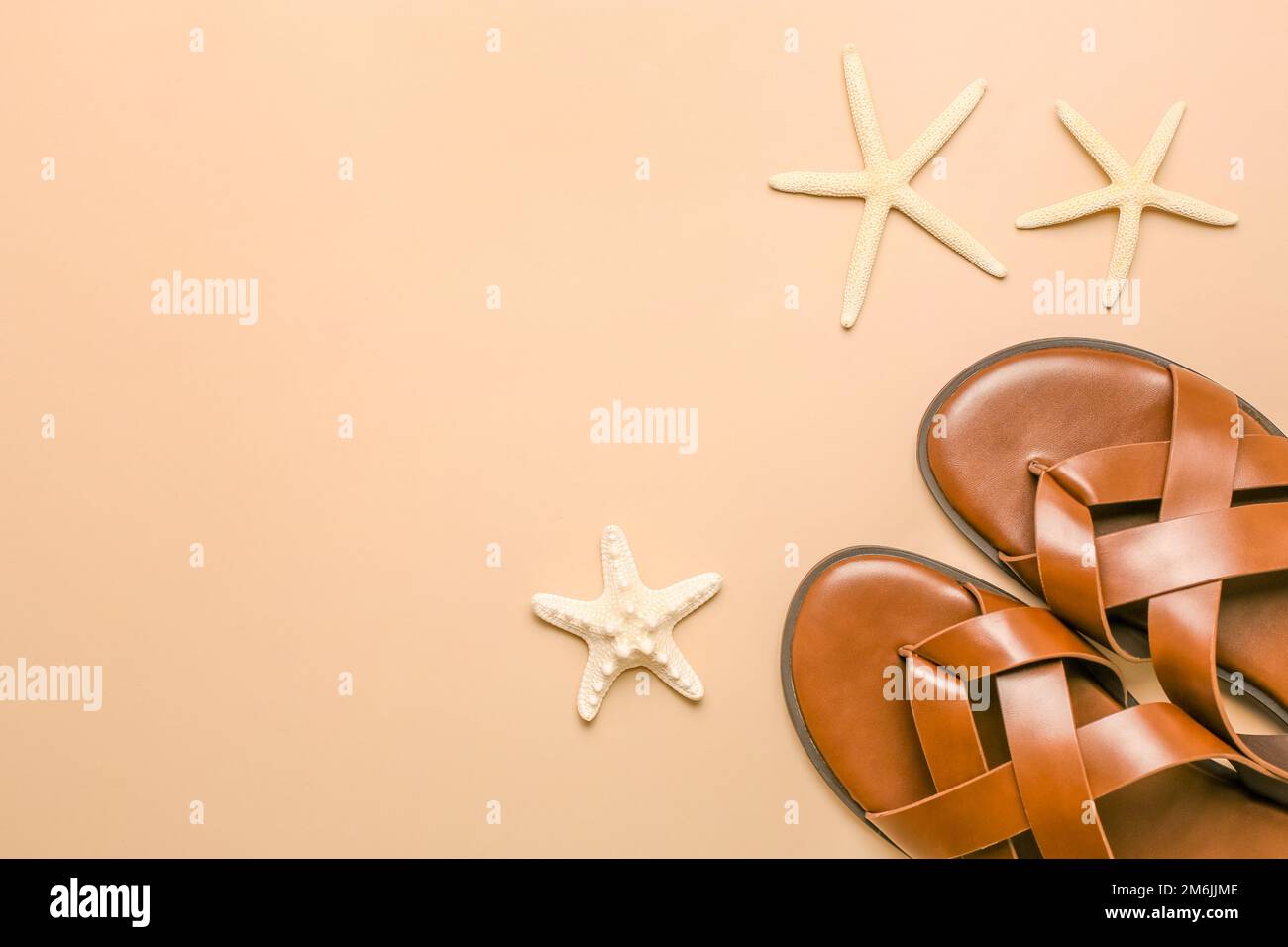 Starfish sea and sandals on beach beige background. Summer background ...