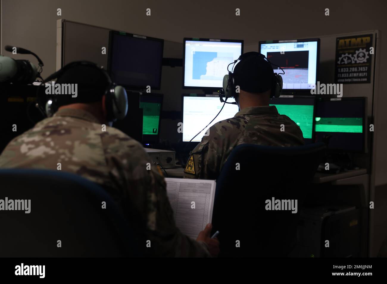 U.S. Army Master Gunners of The U.S. Army Master Gunner School, observe ...