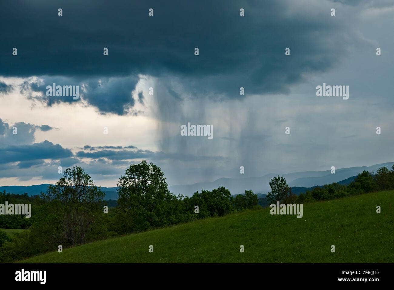 Clouds and dramatic rain and beautiful scenery hi-res stock photography ...