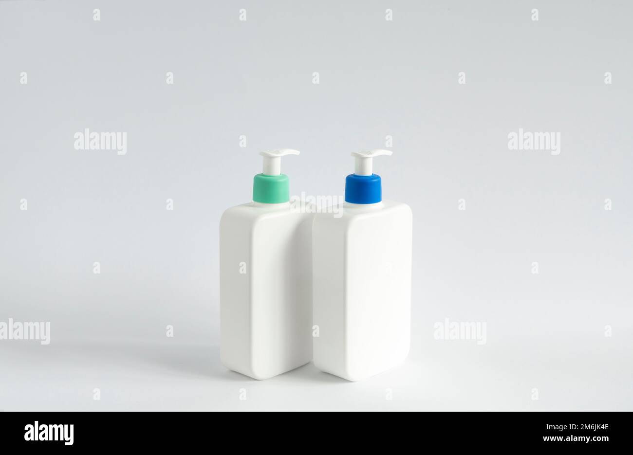 Two liquid containers for shampoo, gel, lotion, cream, bath foam etc ...