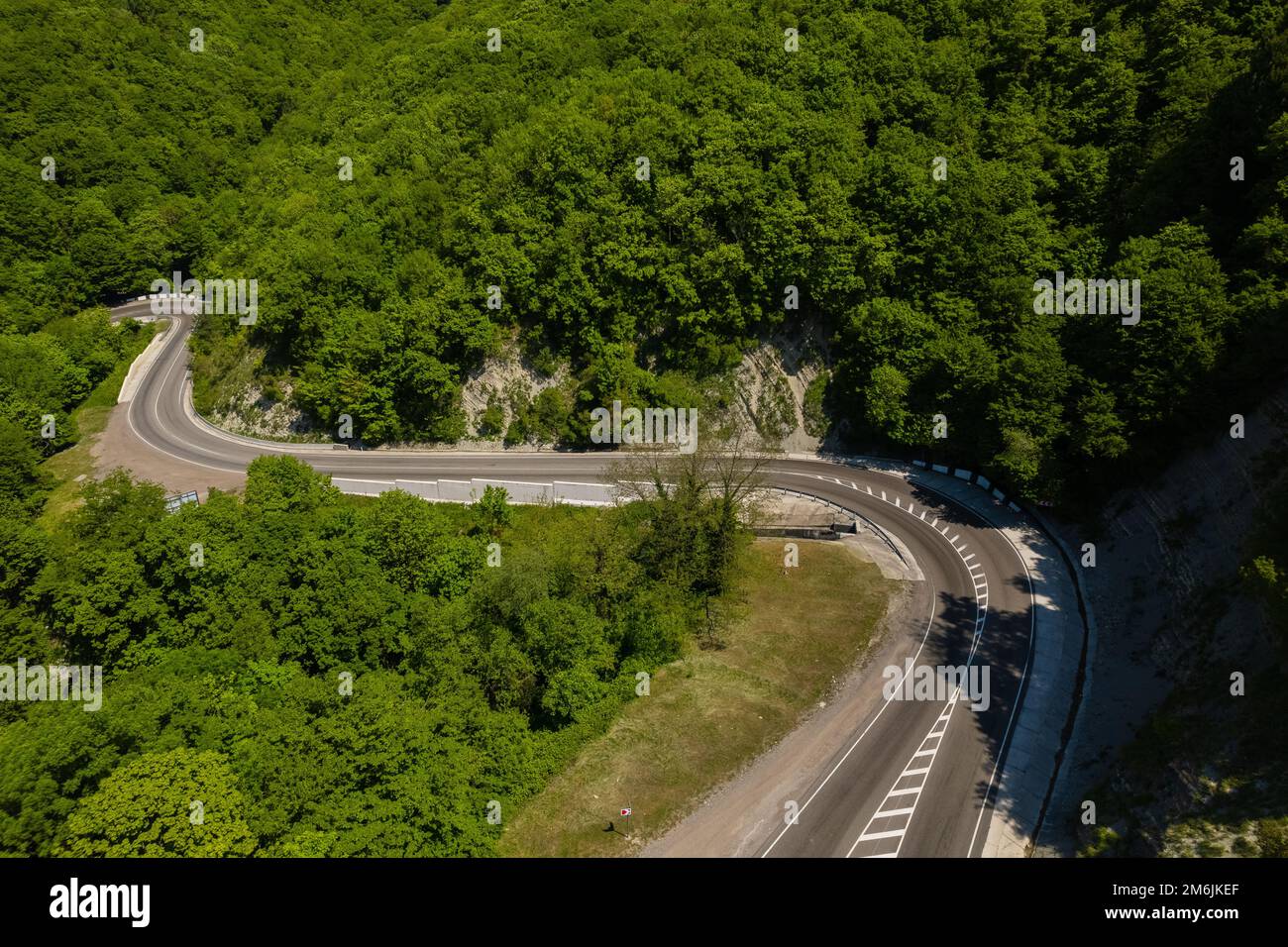 Cars driving on curvy road hi-res stock photography and images - Alamy