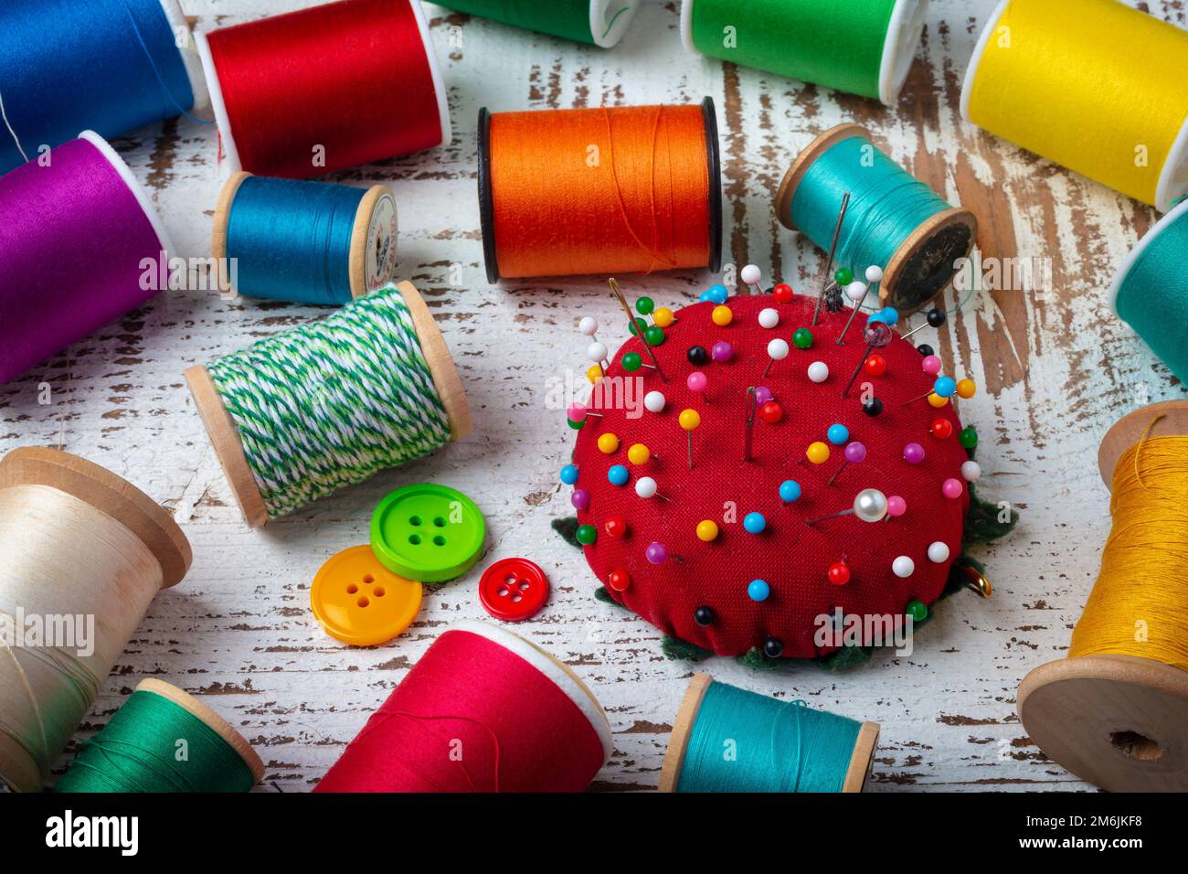 Pinchurshin And Thread With Buttons Still Life Stock Photo - Alamy