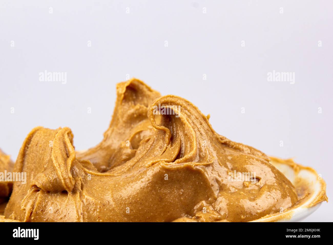Peanut butter texture background. Creamy smooth brown walnut swirl ...