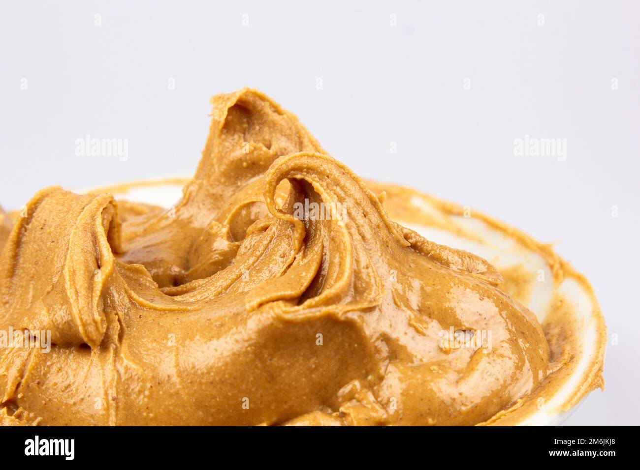 Peanut butter texture background. Creamy smooth brown walnut swirl ...