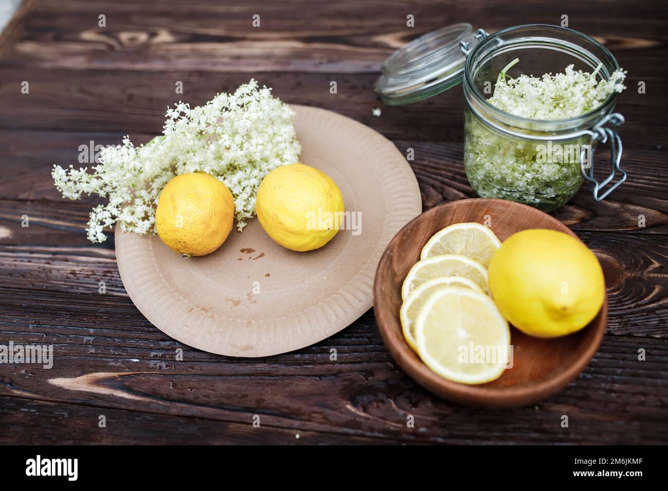 Ingredients for making a drink of elderberry and lemons. Lemon slices ...