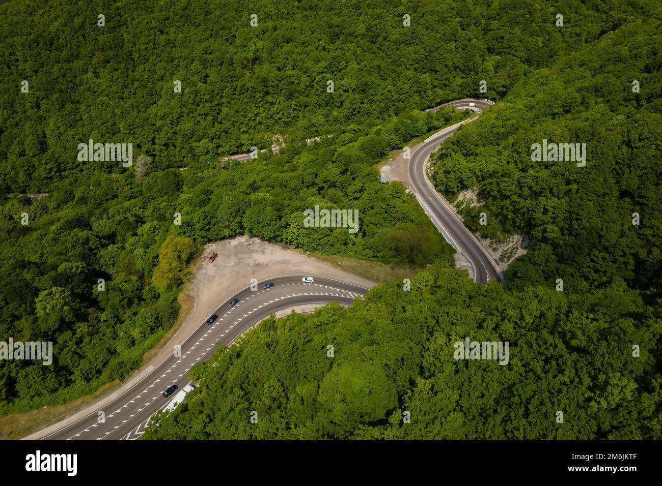 Aerial view of winding road from the high mountain pass. Great road ...