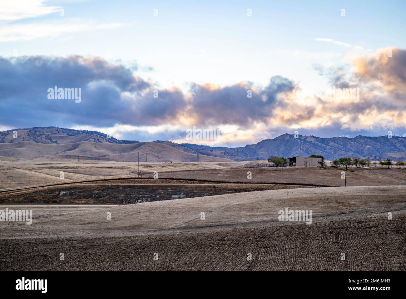 Agricultural atmospheric landscape with farmland with plowed fields and ...