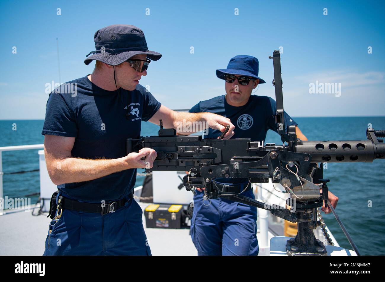 Coast Guard Cutter Daniel Tarr crew members conduct M2 Browning .s0 ...