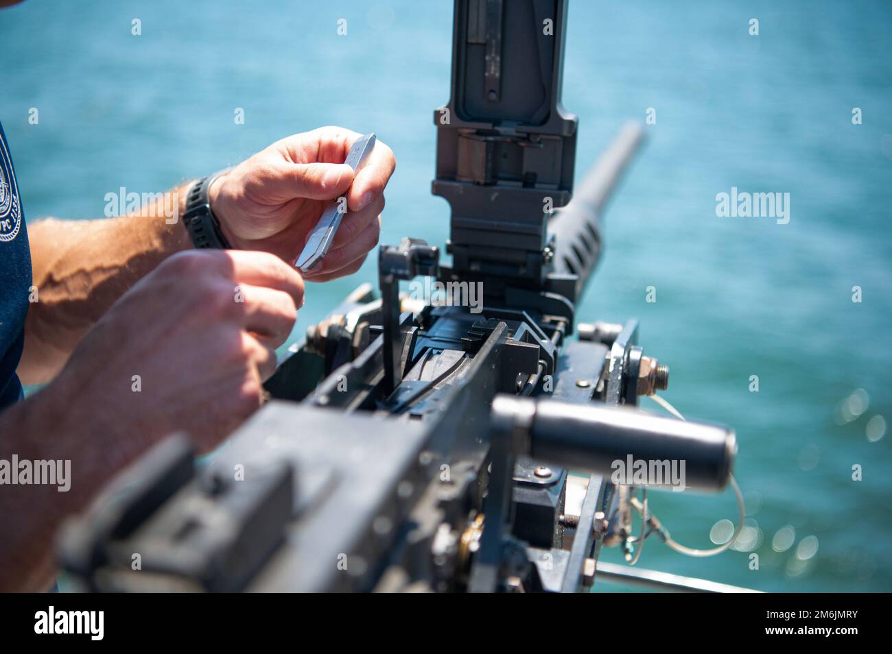Coast Guard Cutter Daniel Tarr crew members conduct M2 Browning .50 ...