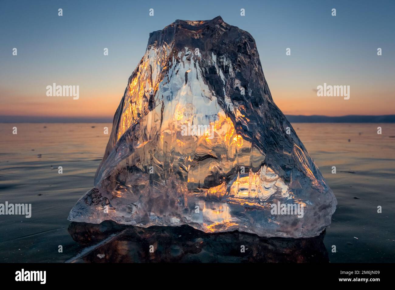 Sunlight refracted in piece of ice Stock Photo - Alamy