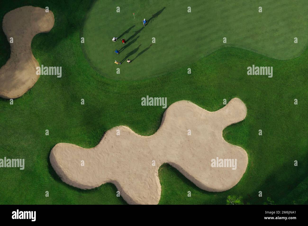Aerial view of players at golf field Stock Photo - Alamy
