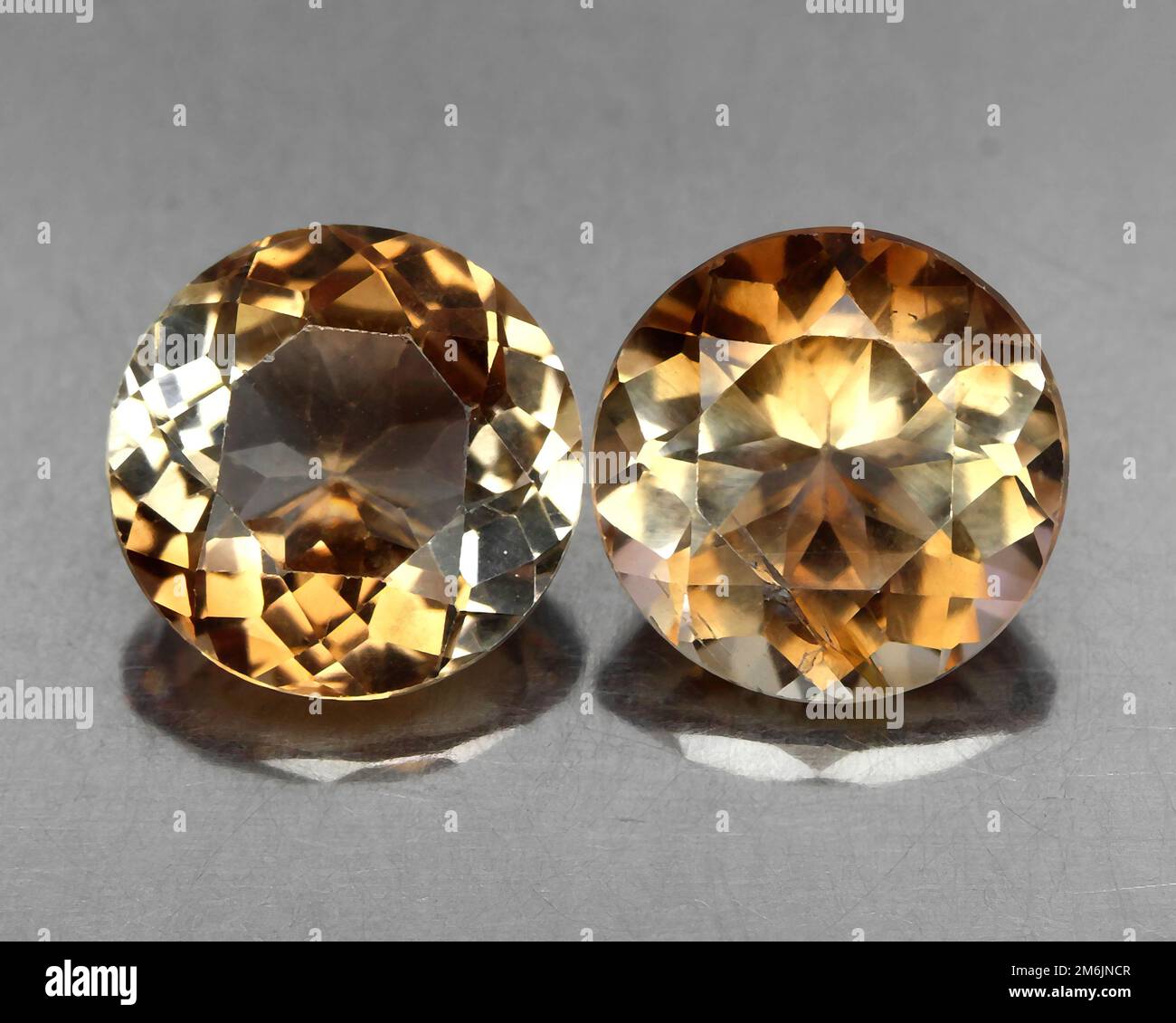 Beautiful natural stone imperial topaz on a gray background Stock Photo ...