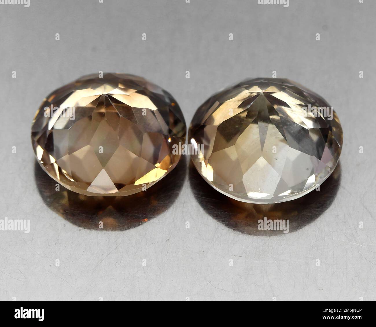 Beautiful natural stone imperial topaz on a gray background Stock Photo ...