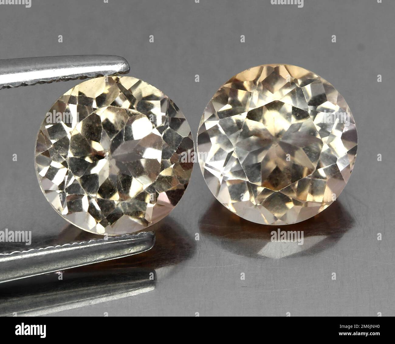 Beautiful natural stone imperial topaz on a gray background Stock Photo ...