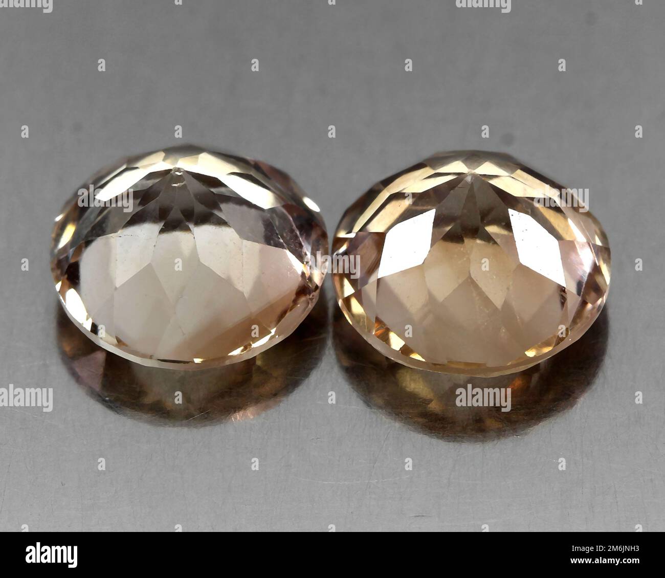 Beautiful natural stone imperial topaz on a gray background Stock Photo ...