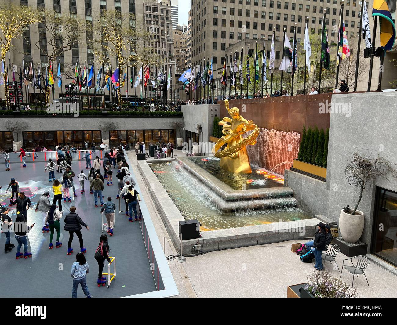 People are seen roller skating at Rockefeller Center in New York City ...