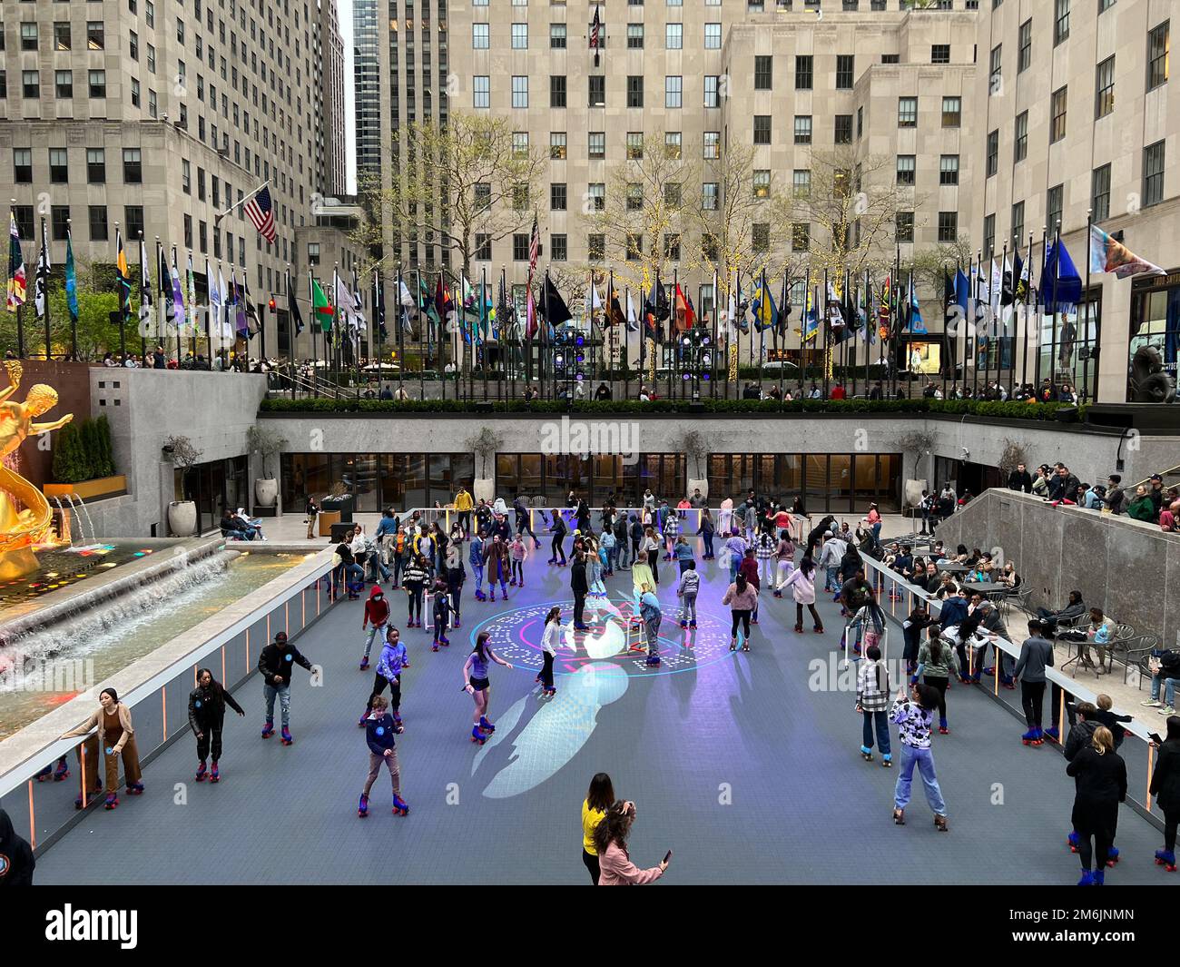 People are seen roller skating at Rockefeller Center in New York City ...
